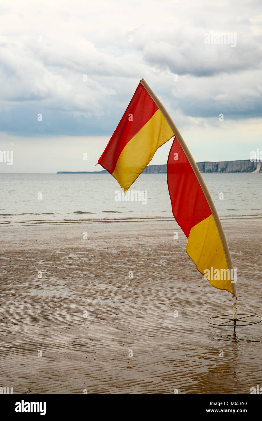 Lifeguard's safety flag on the beach at filey bay yorkshire Stock Photo ...