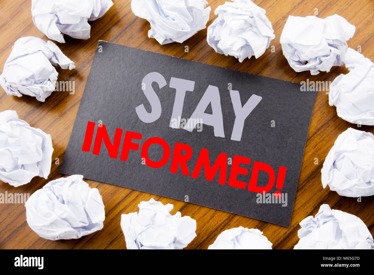 Hand writing text caption showing Stay Informed. Business concept for ...