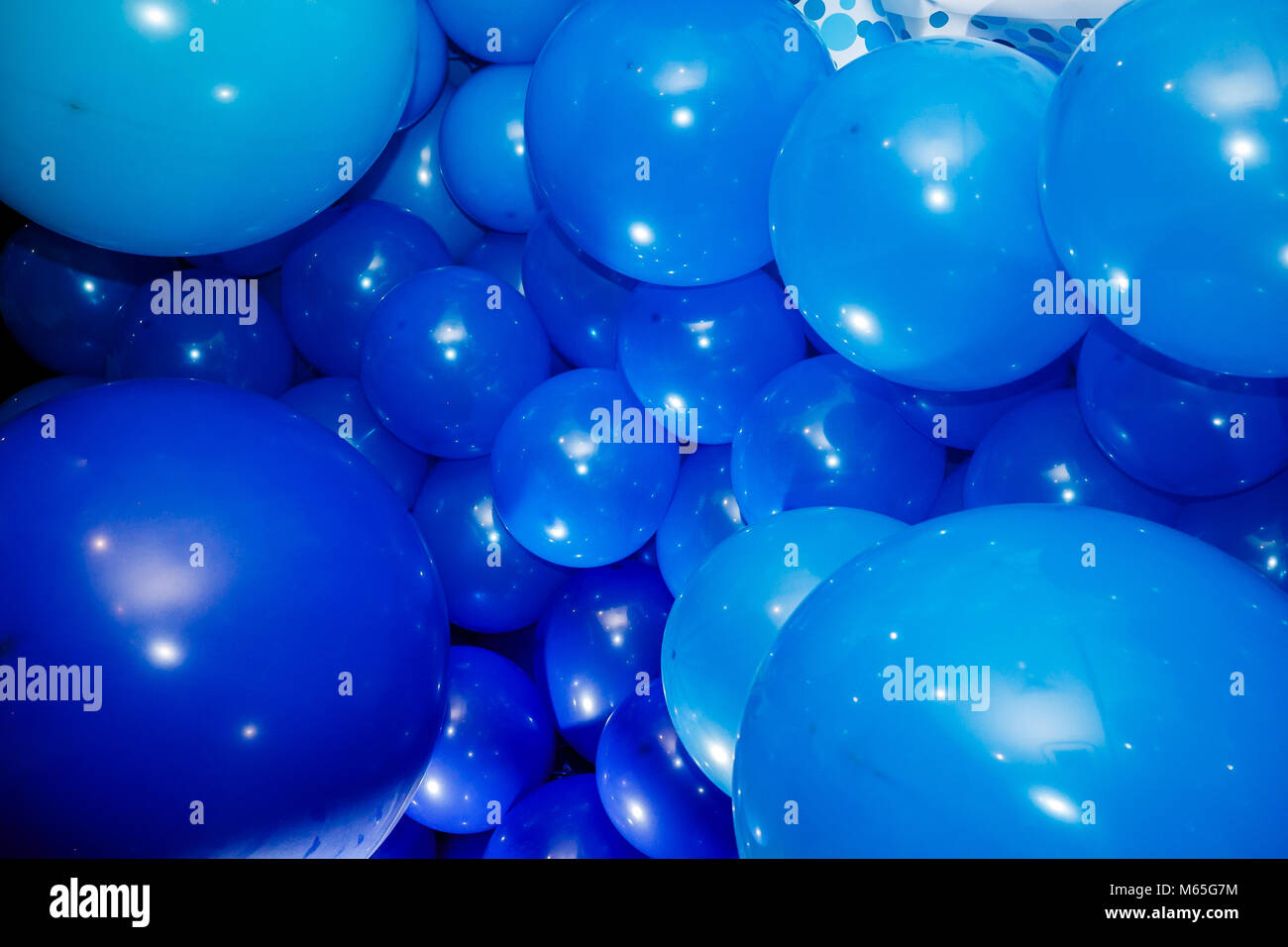 Party blue balloons background Stock Photo - Alamy