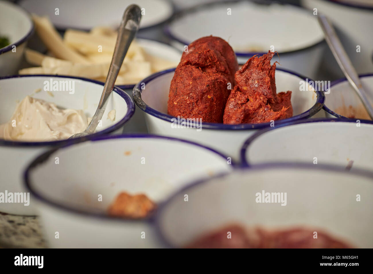 Pizza toppings in a white and blue enamel bowl at the Grade II listed ...