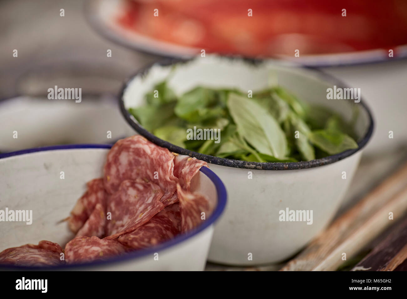Pizza toppings in a white and blue enamel bowl at the Grade II listed ...