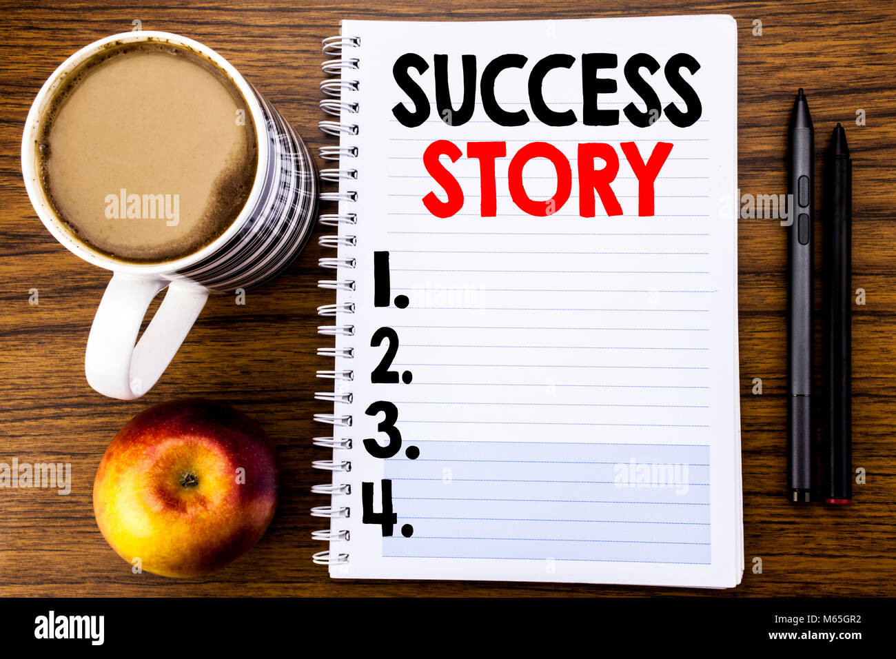 Handwritten text showing Success Story. Business concept for ...