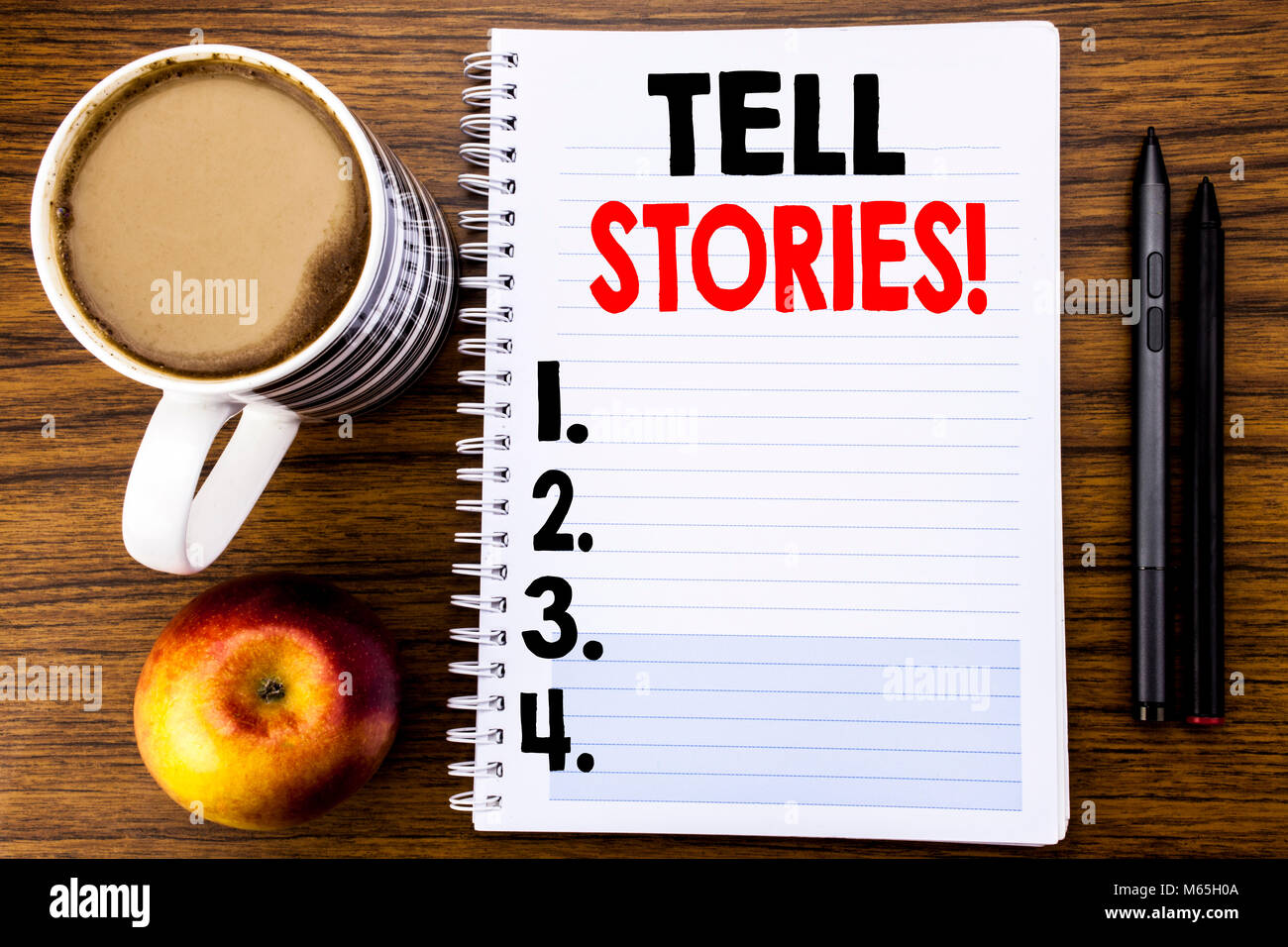 Handwritten text showing Tell Stories. Business concept for ...