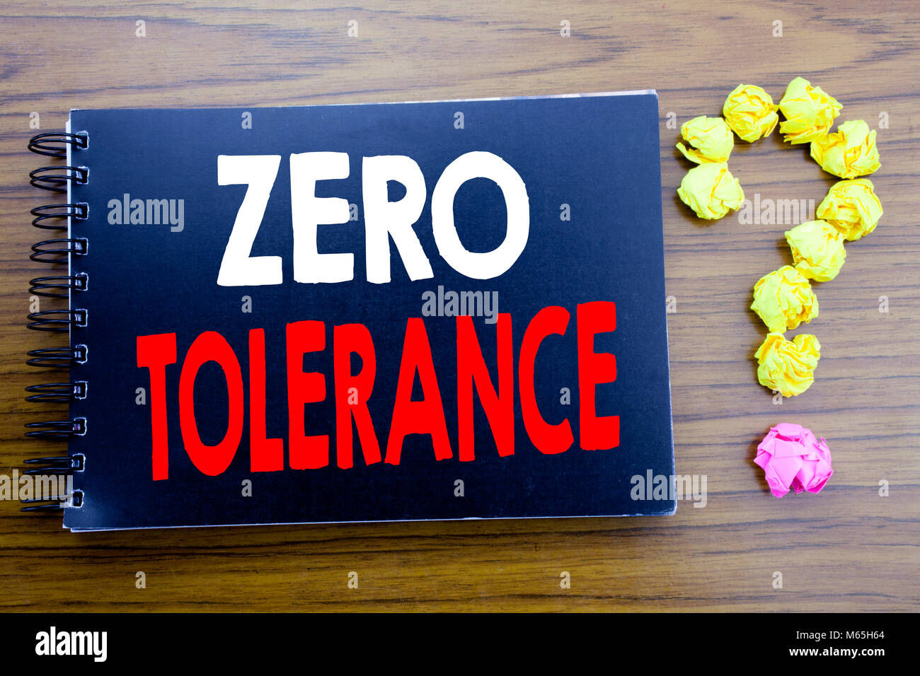 Handwritten text showing Zero Tolerance. Business concept writing for ...