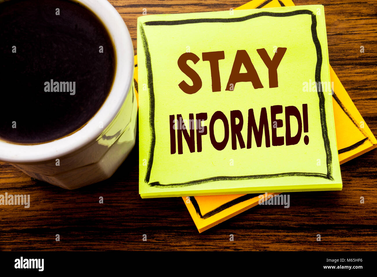 Handwritten text showing Stay Informed. Business concept for Be ...