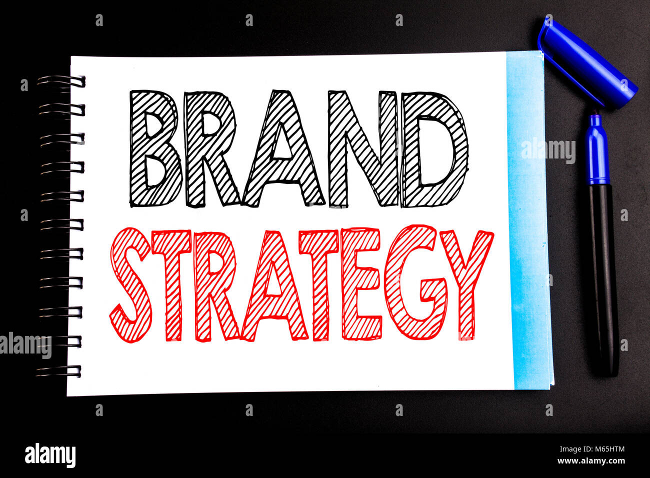 Handwritten text showing Brand Strategy. Business concept writing for ...