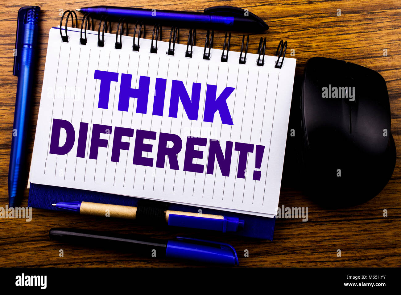 Handwritten text showing Think Different. Business concept for Outside ...