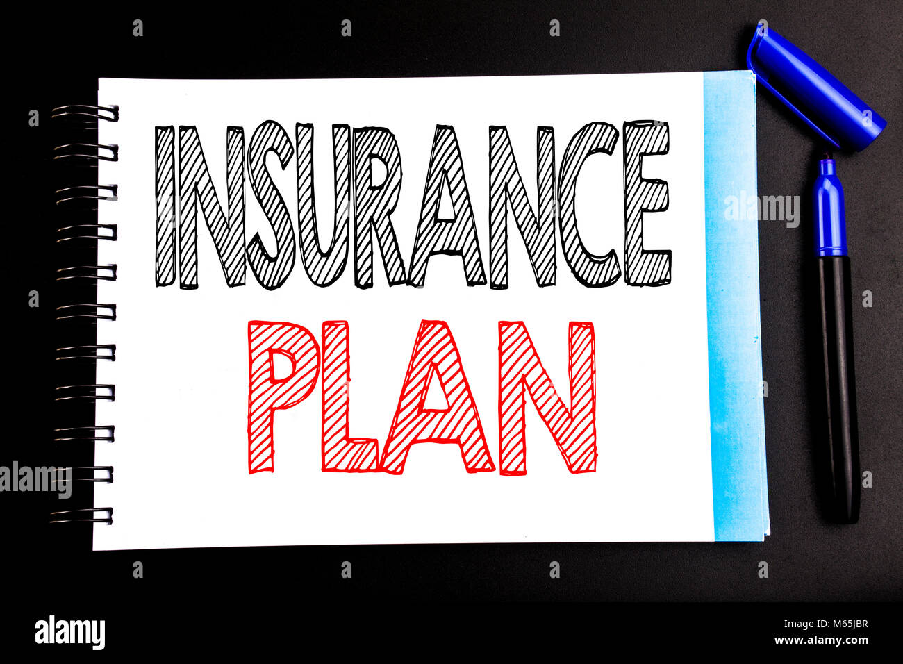 Handwritten text showing Insurance Plan. Business concept writing for ...