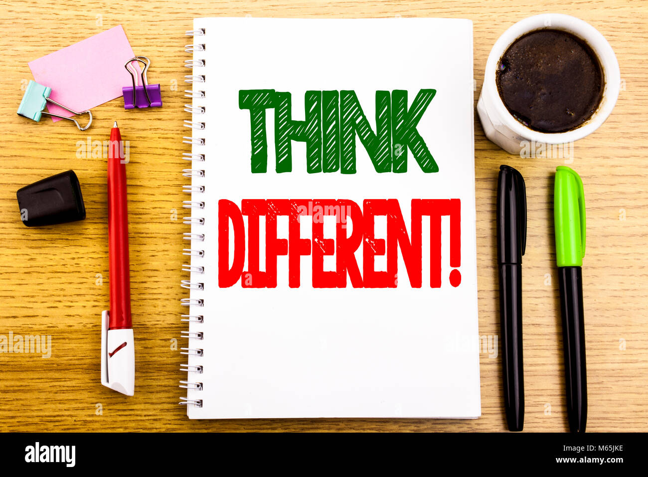 Hand writing text caption showing Think Different. Business concept for ...