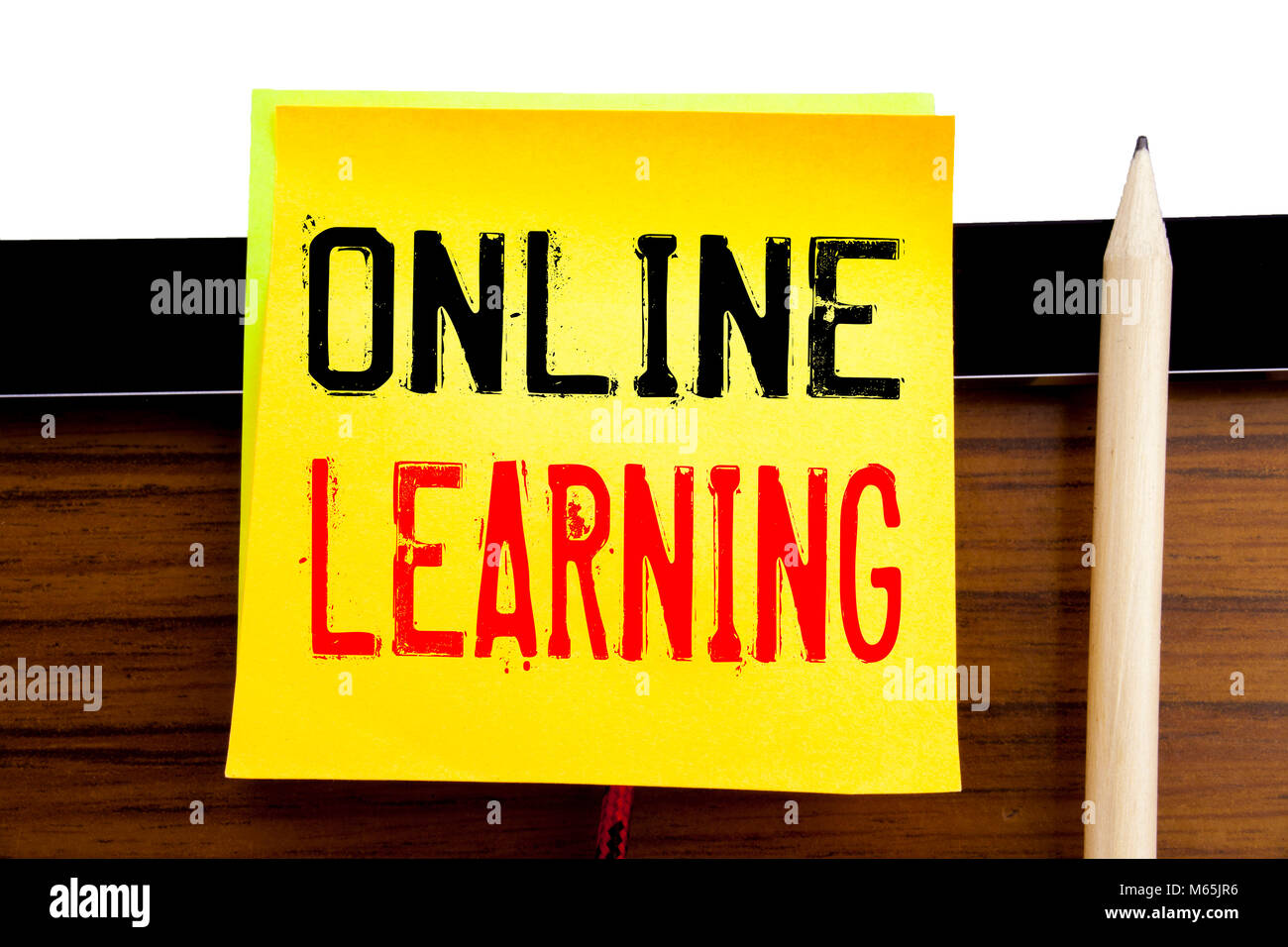 Hand writing text caption inspiration Online Learning. Business concept ...