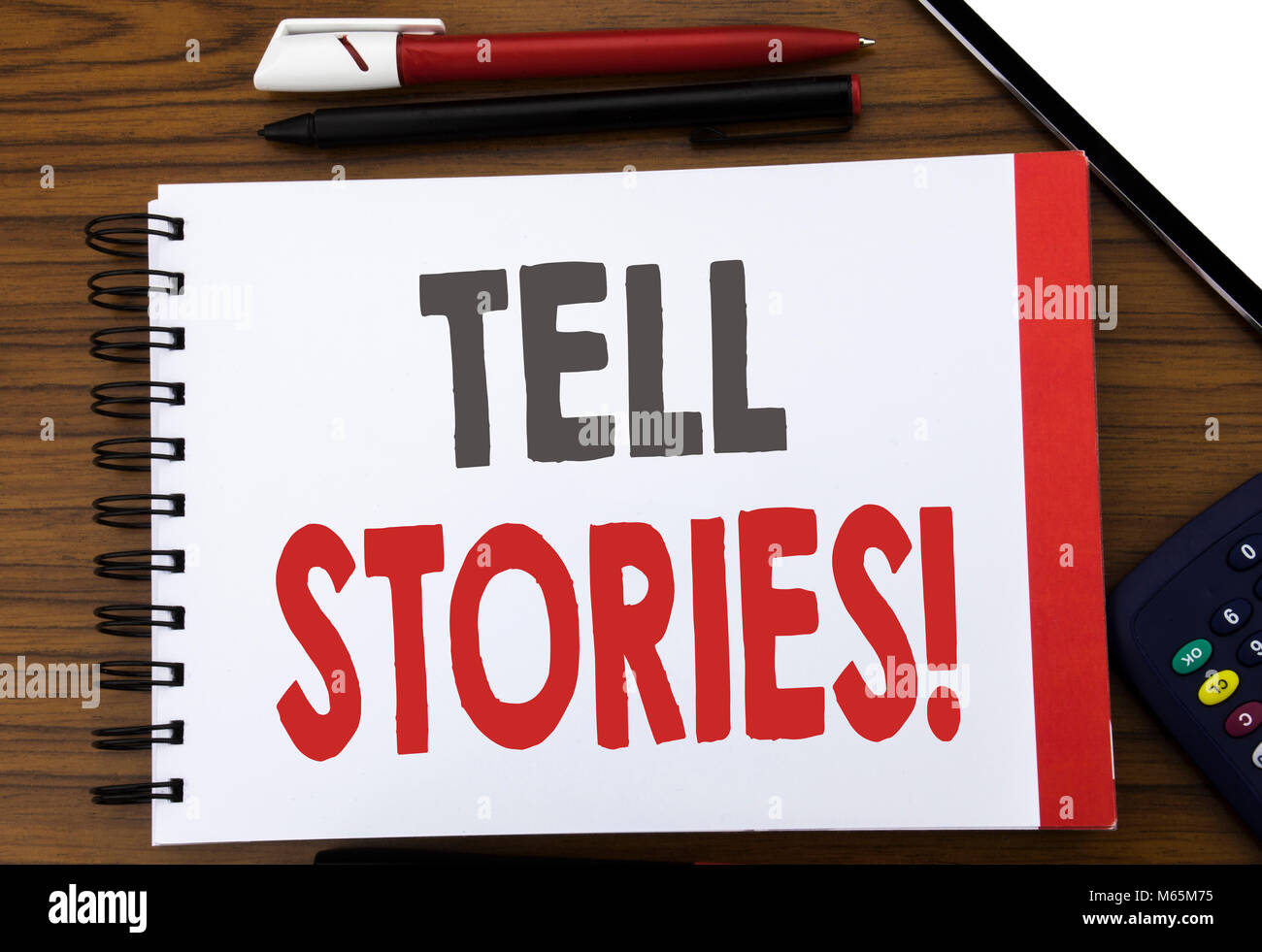 Handwritten text showing Tell Stories. Business concept writing for ...