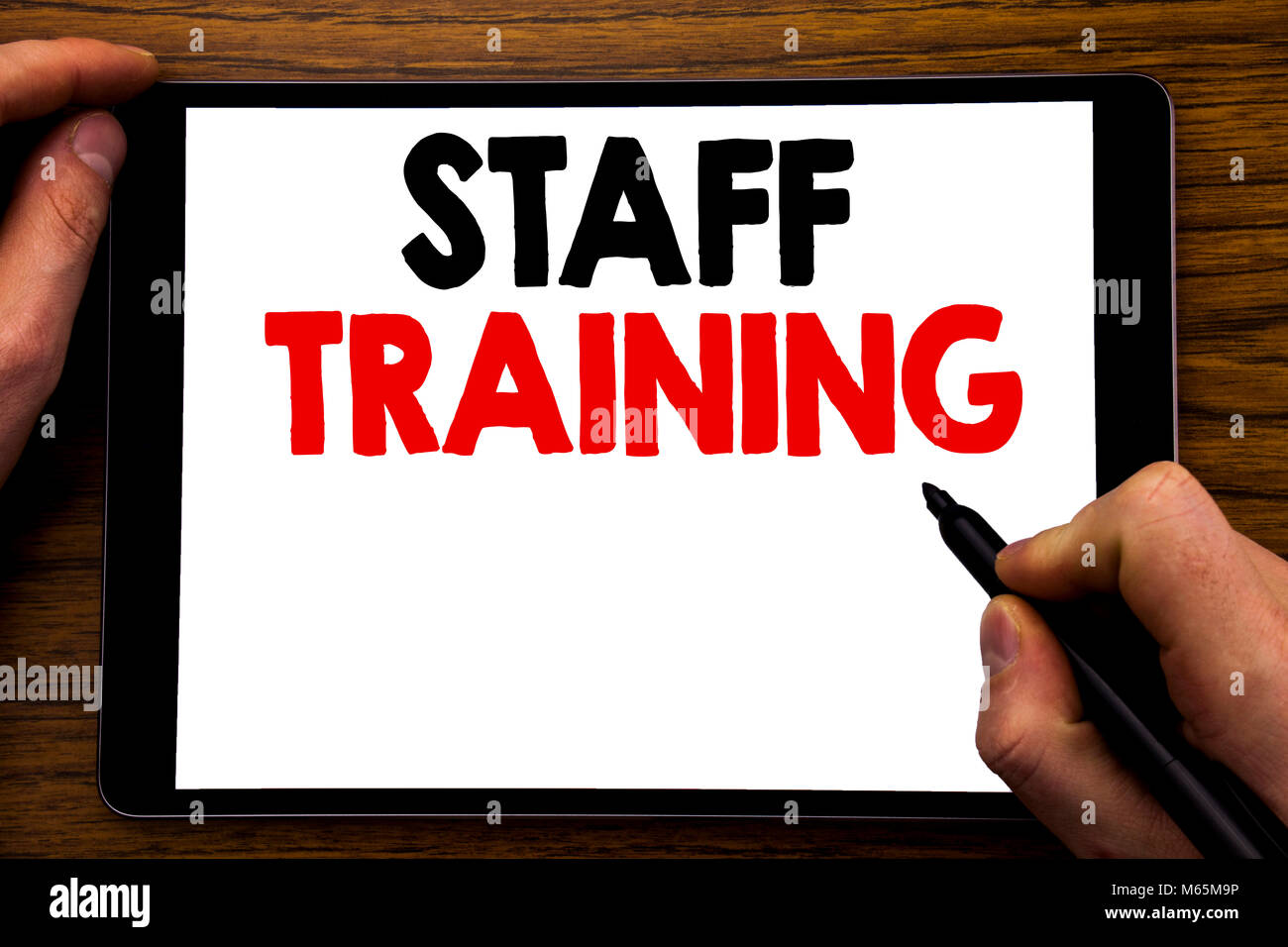 Handwriting Announcement text showing Staff Training. Business concept ...