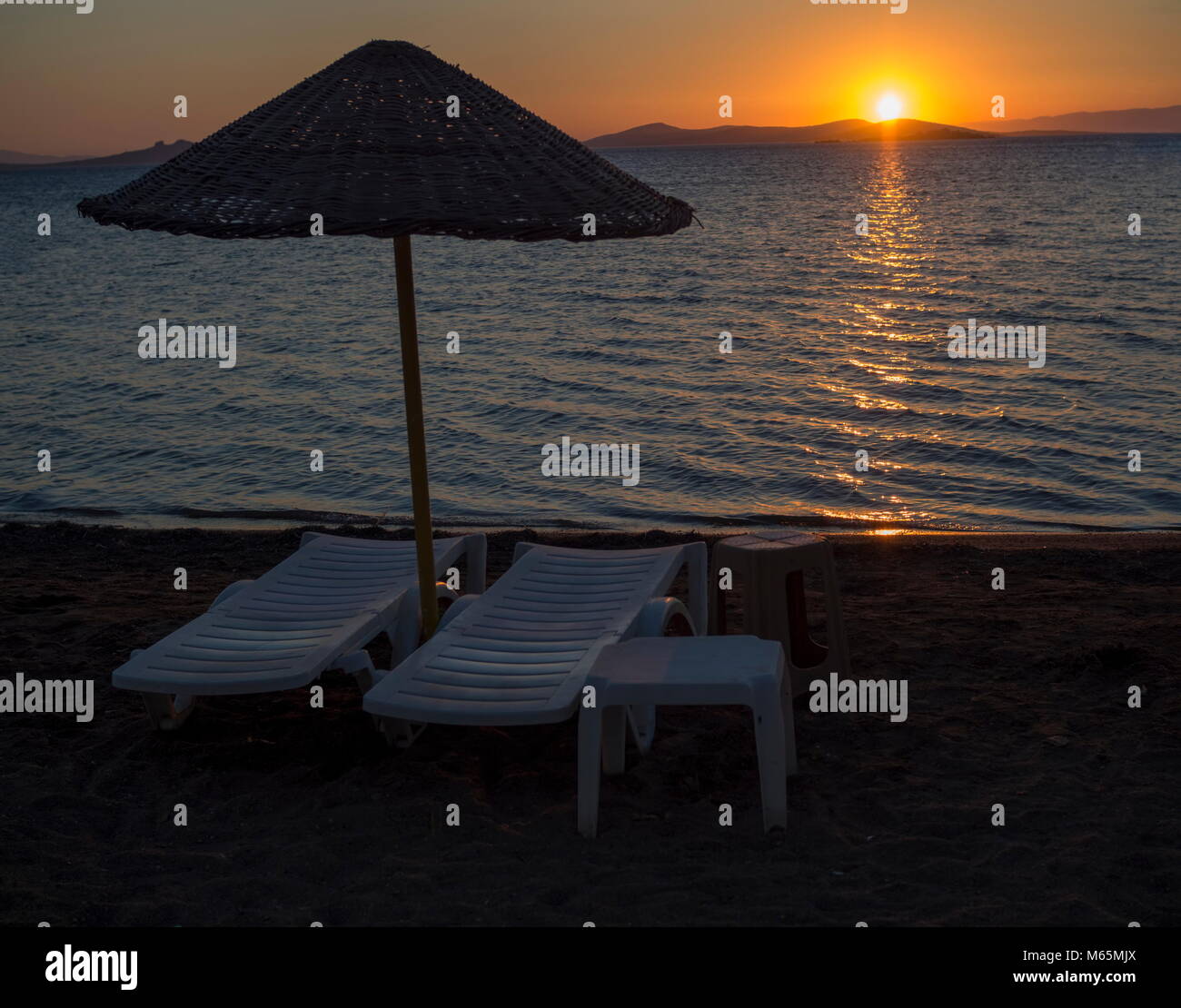 Resting on the beach in the summertime Stock Photo - Alamy