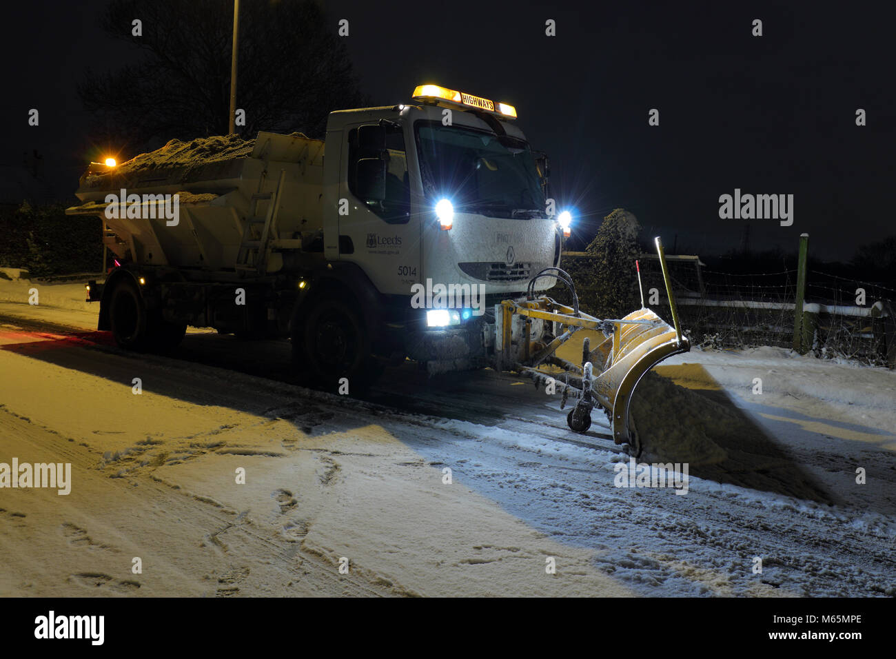 Snow Plough & Gritter in the early hours in Leeds Stock Photo - Alamy