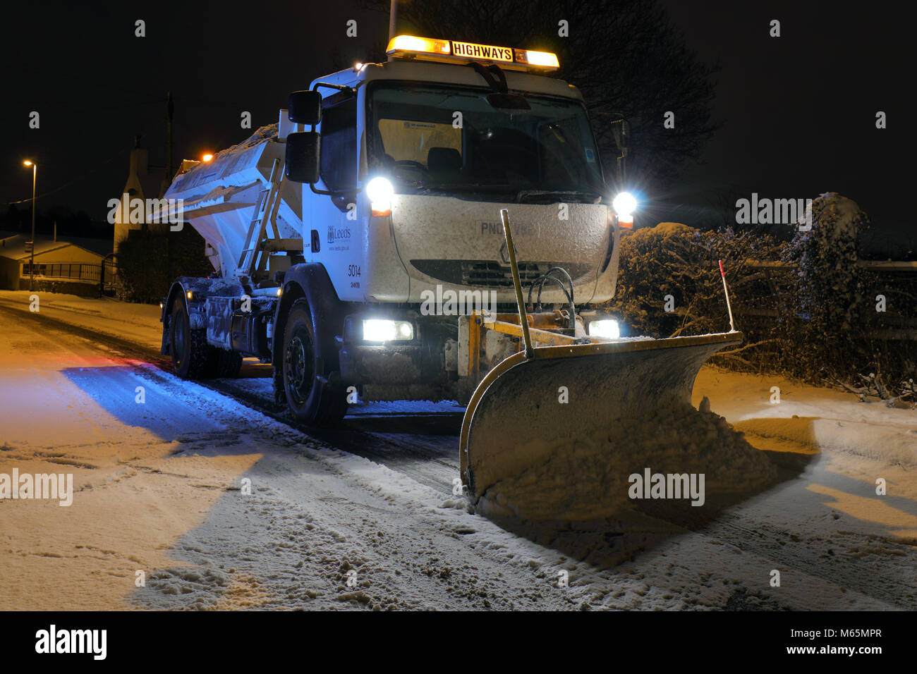 Snow Plough & Gritter in the early hours in Leeds Stock Photo - Alamy