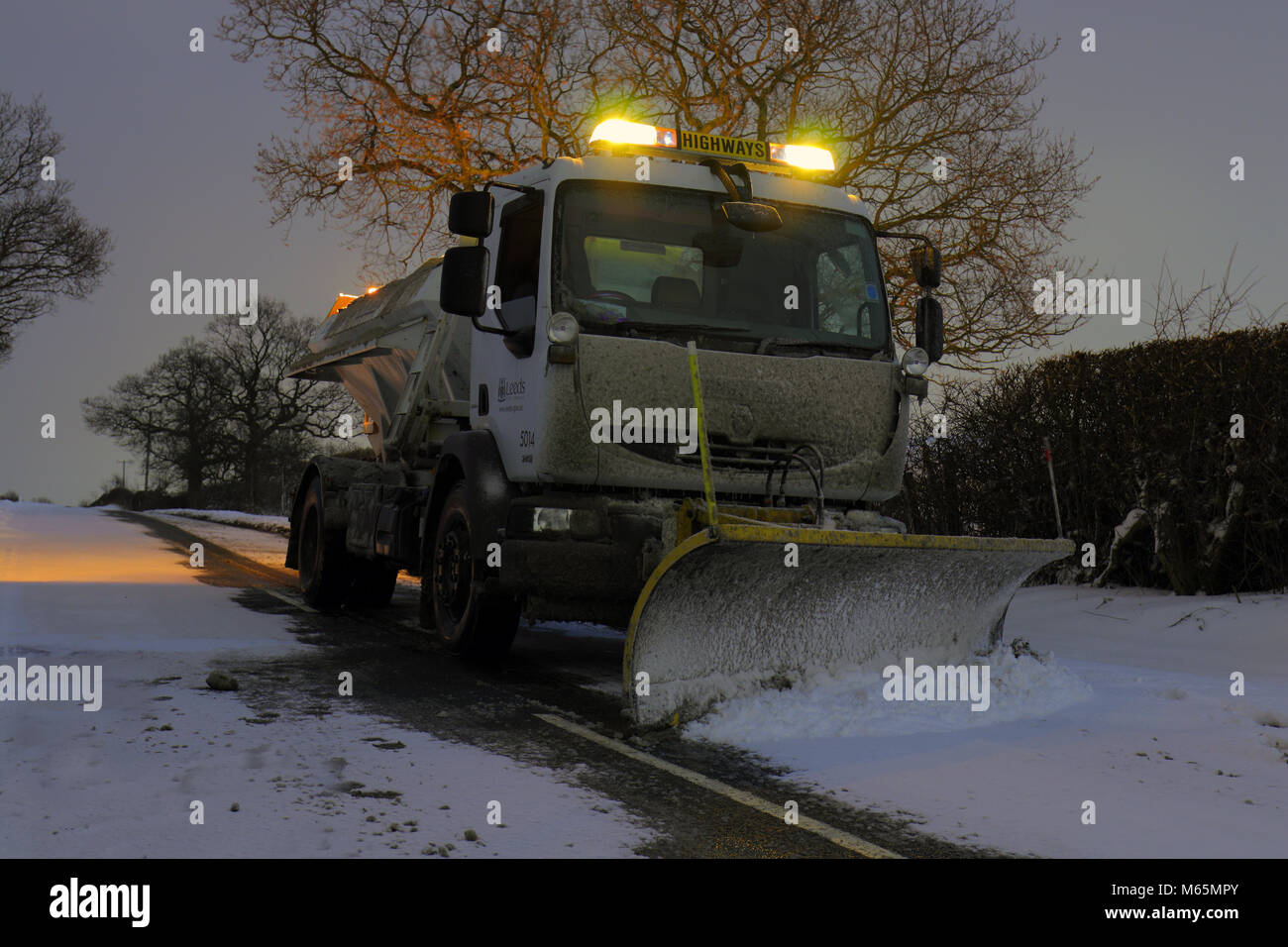 Snow Plough & Gritter in the early hours in Leeds Stock Photo - Alamy