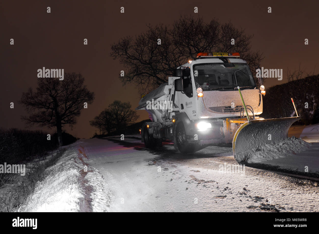 Snow Plough & Gritter in the early hours in Leeds Stock Photo - Alamy