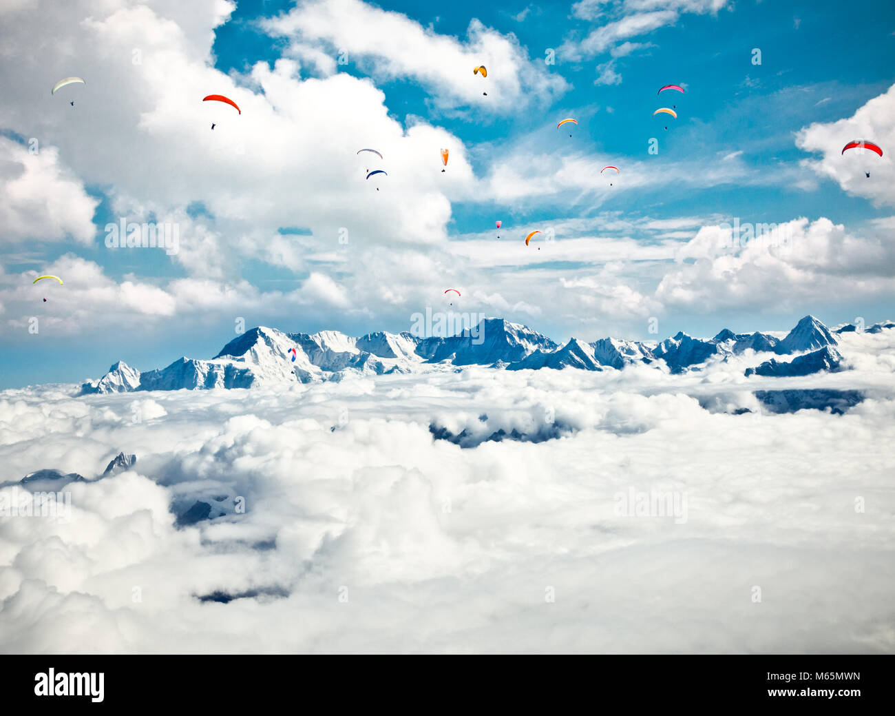 Paraglider flying against the Himalayas-Everest region, Nepal Stock ...