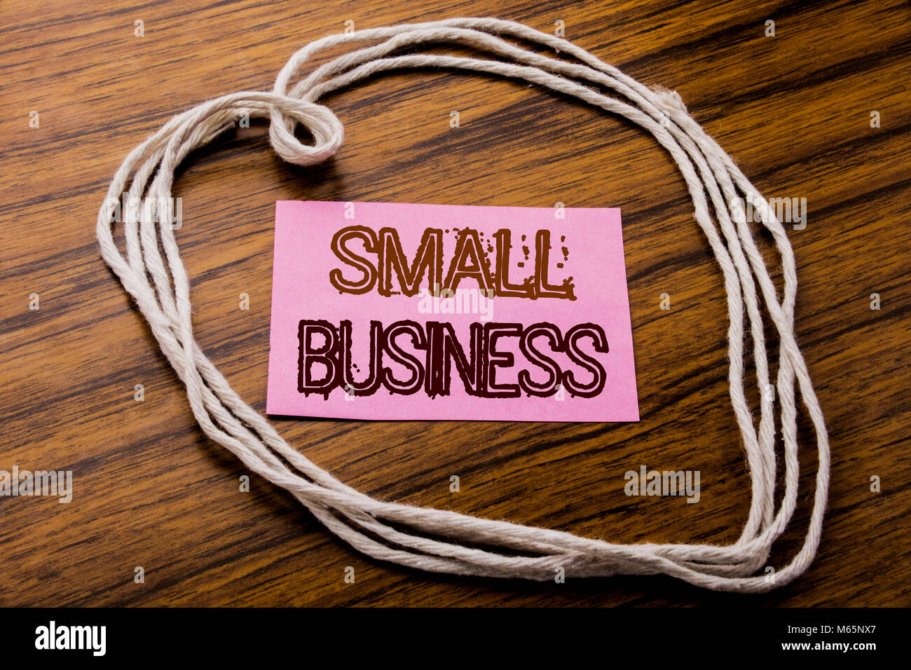 Handwritten text showing Small Business. Business concept for Strategy ...