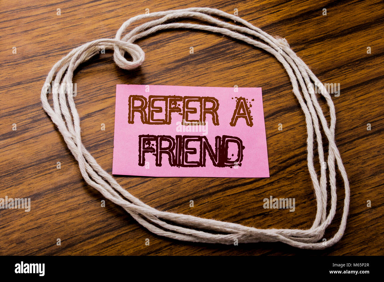 Handwritten text showing Refer A Friend. Business concept for Referral ...