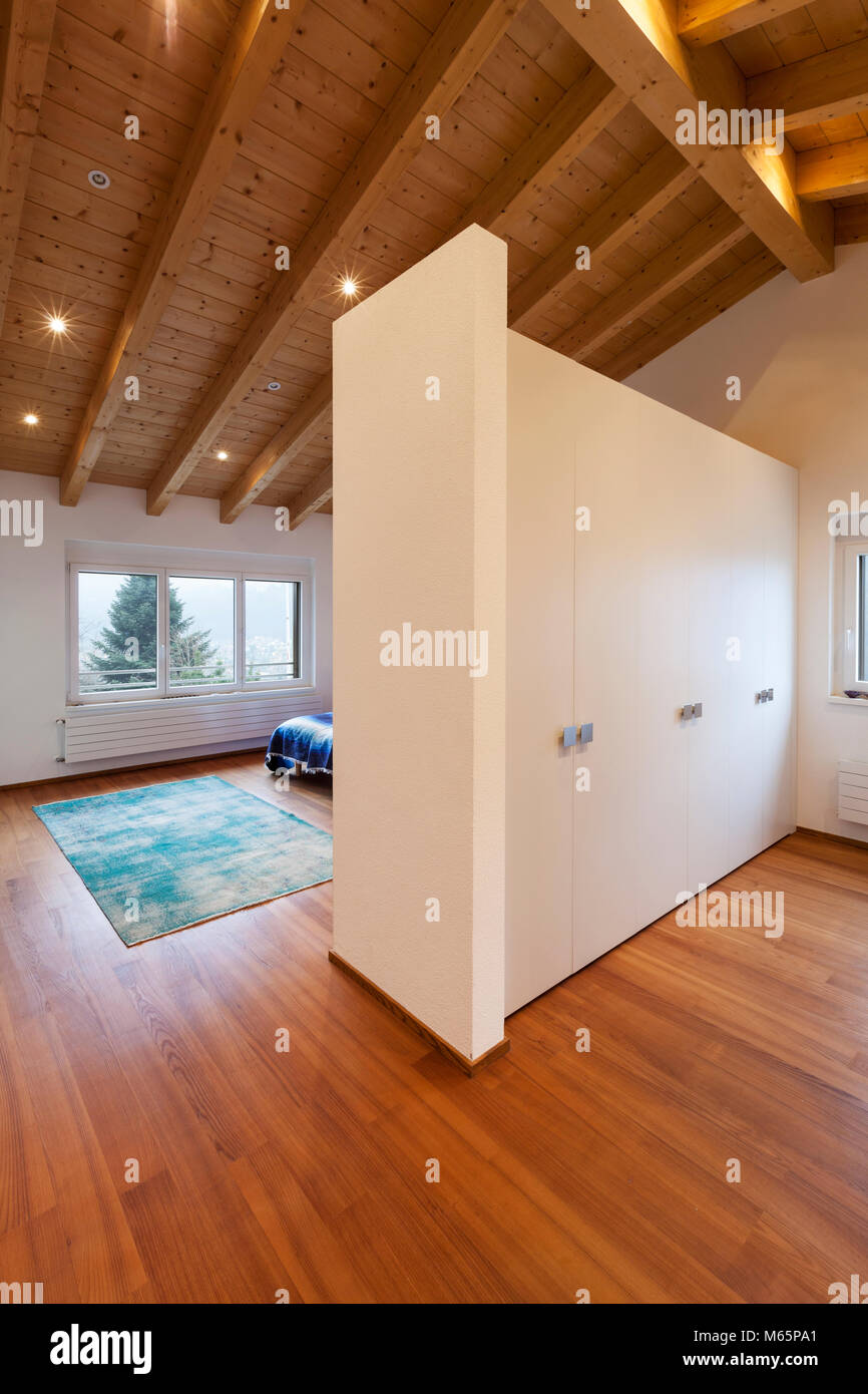 Beautiful modern loft, bedroom view from passage Stock Photo - Alamy