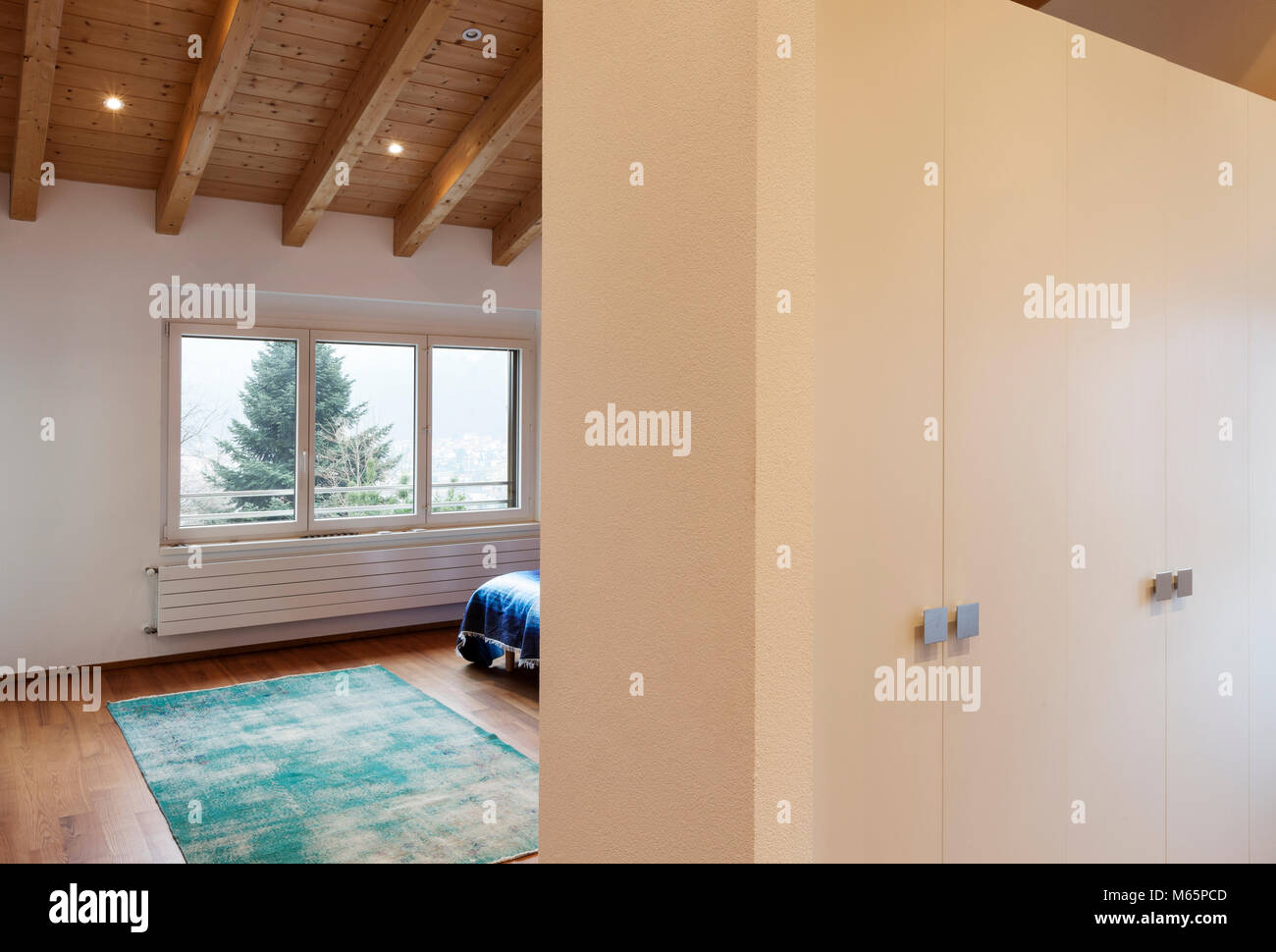 Beautiful modern loft, bedroom view from passage Stock Photo - Alamy