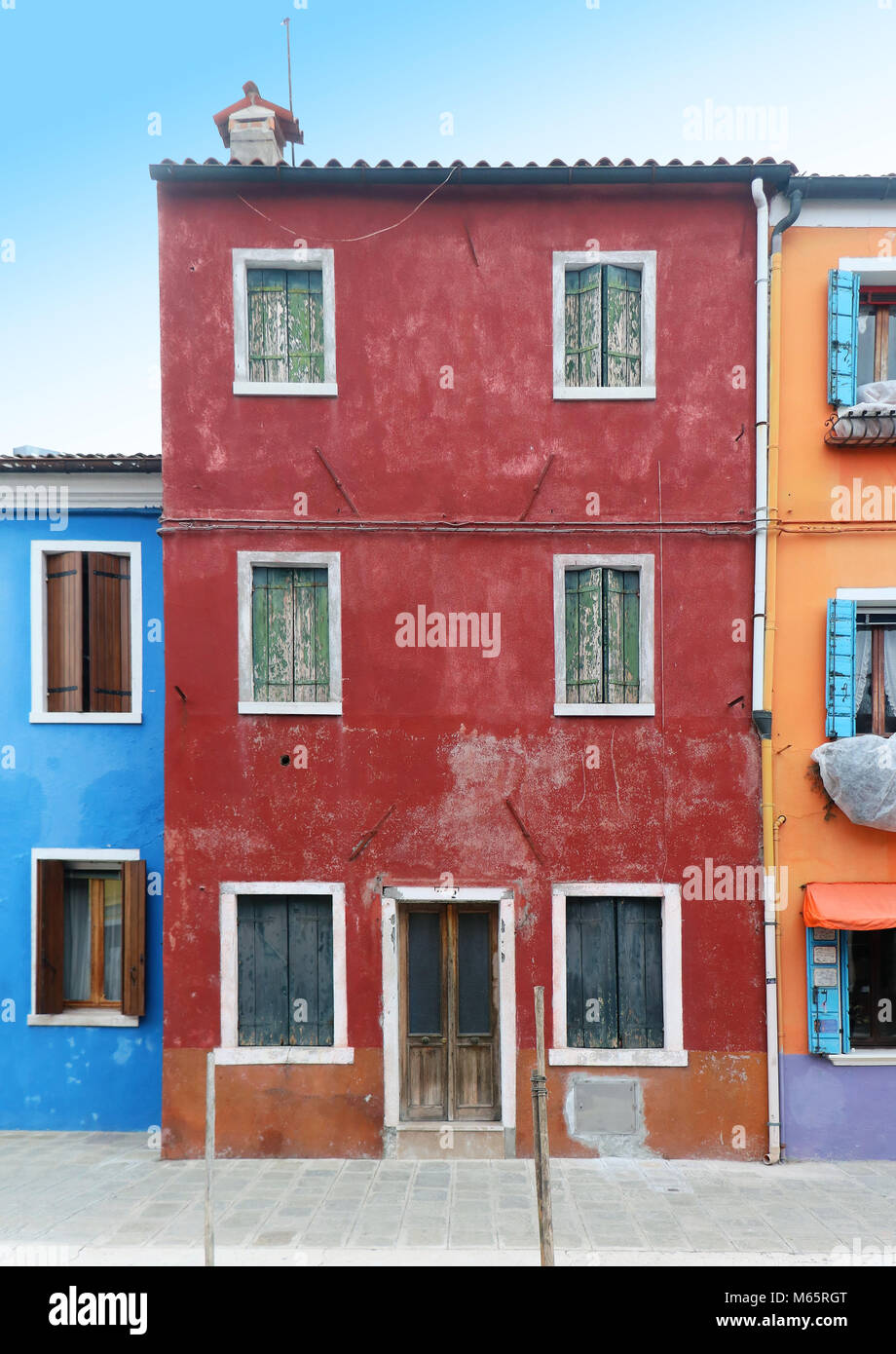 Old house with colorful grunge facade and retro windows exterior Stock ...