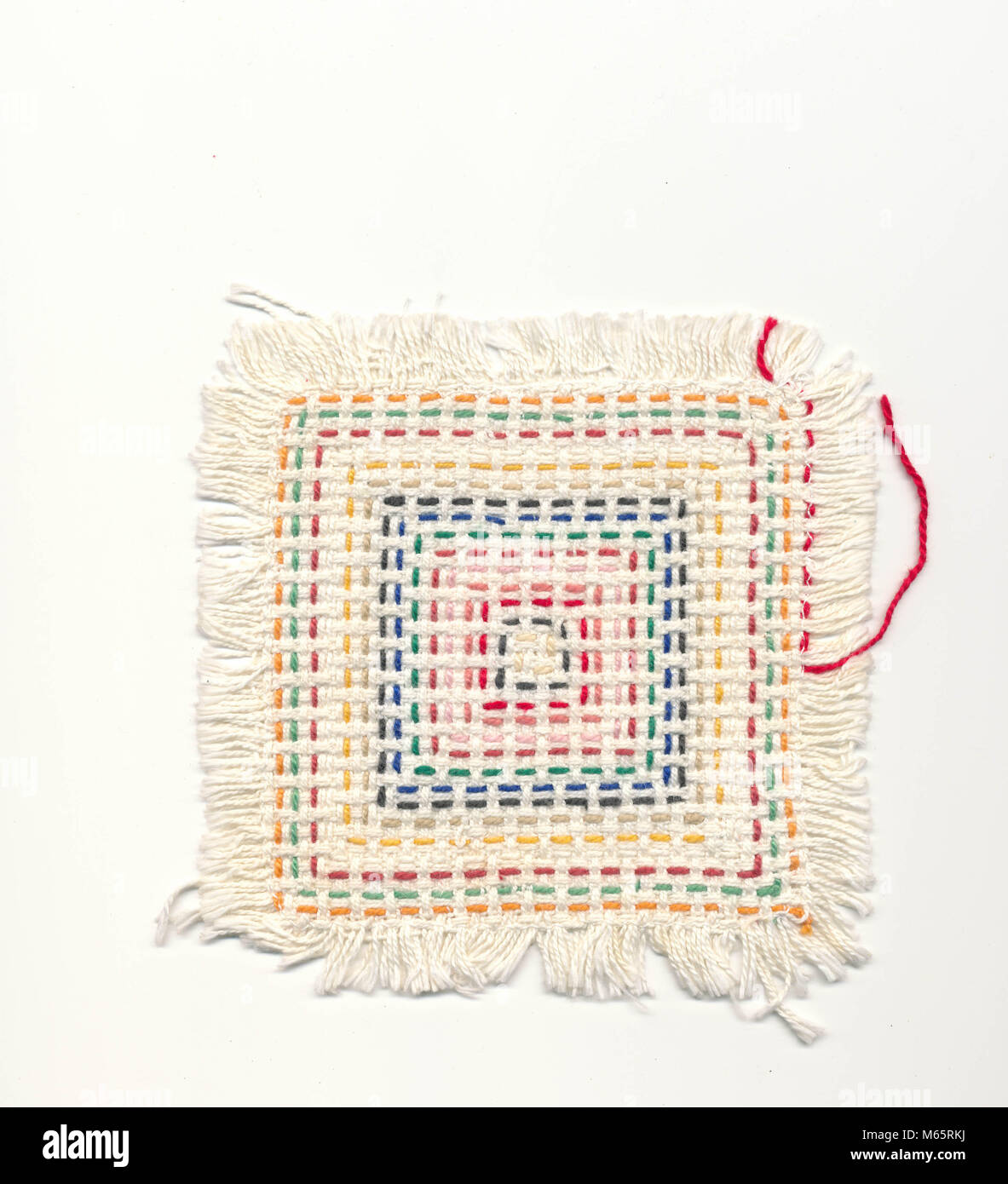 Child's embroidery, white background, simple stitches Stock Photo - Alamy