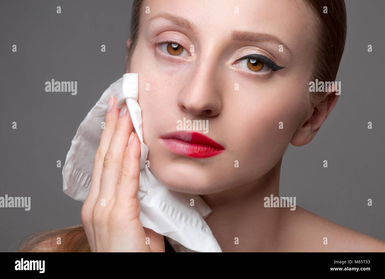 Beautiful Woman Removing Makeup From Her Face Skin Care Concept Stock