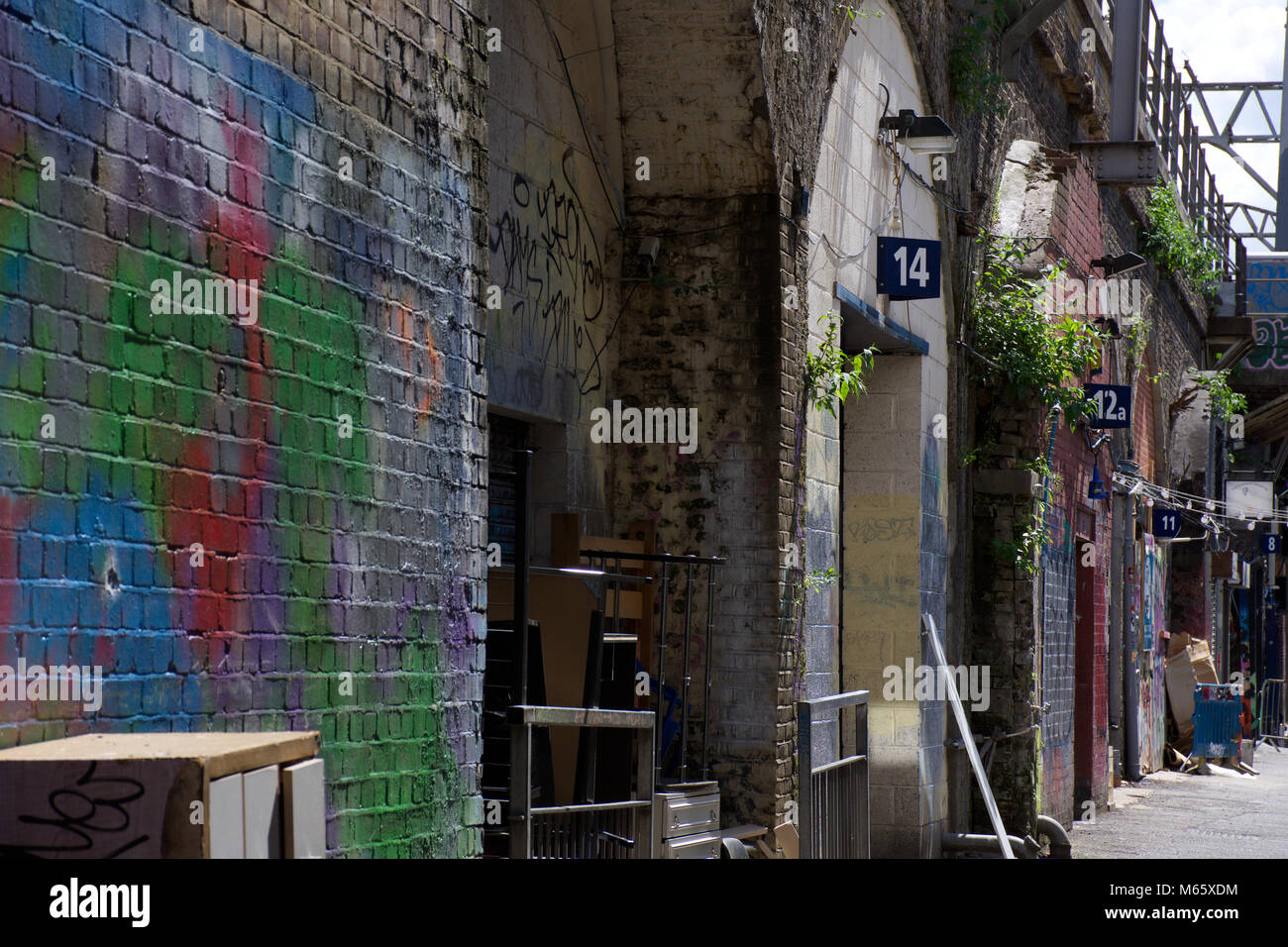 Back alley and arches under London railway network in Bethnal Green ...