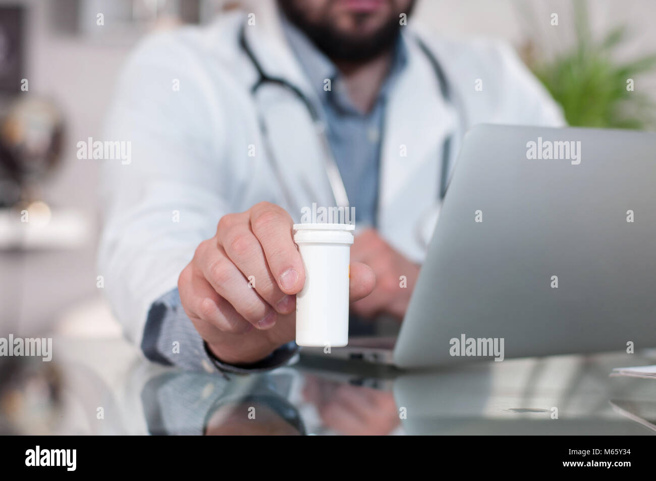 Medical, doctor concept. Doctor working on desk with laptop computer in ...