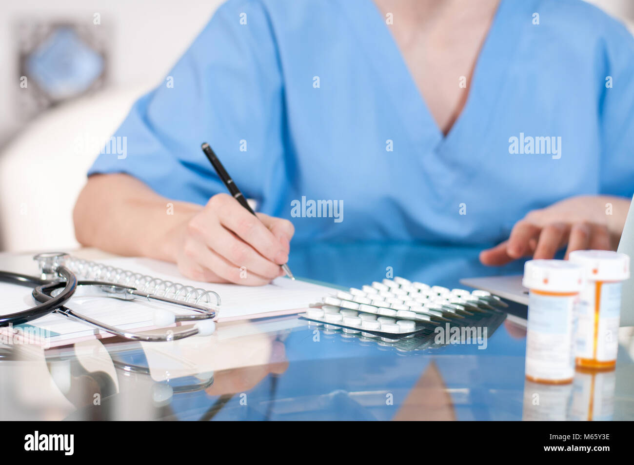 Doctor concept. Medical doctor working at office desk Stock Photo - Alamy