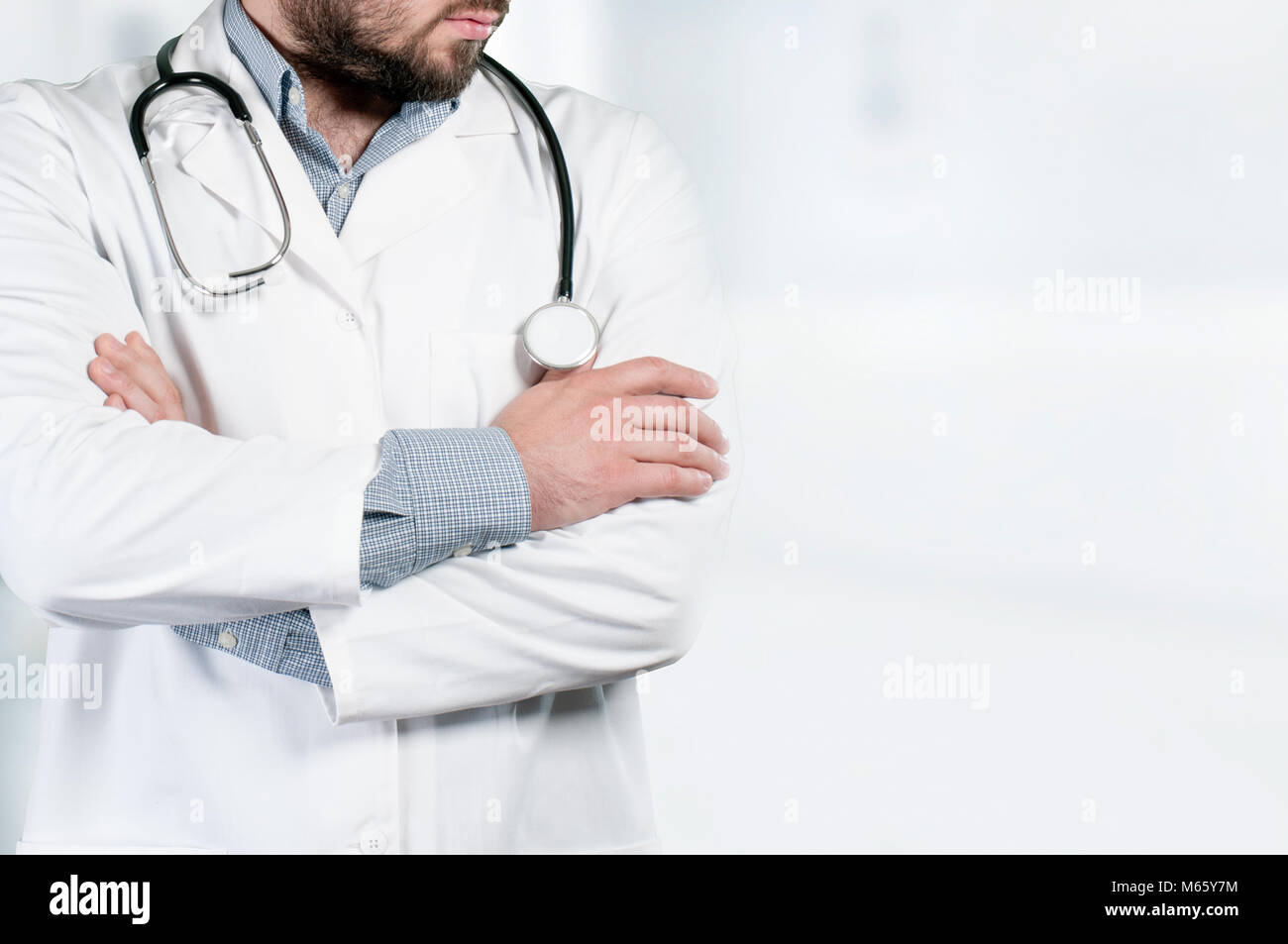 Medical doctor with stethoscope around his neck Stock Photo - Alamy