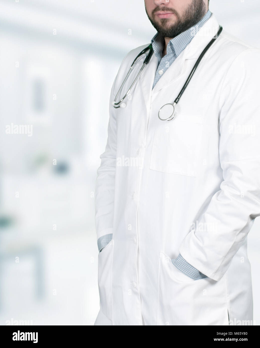 Medical doctor with stethoscope around his neck Stock Photo - Alamy