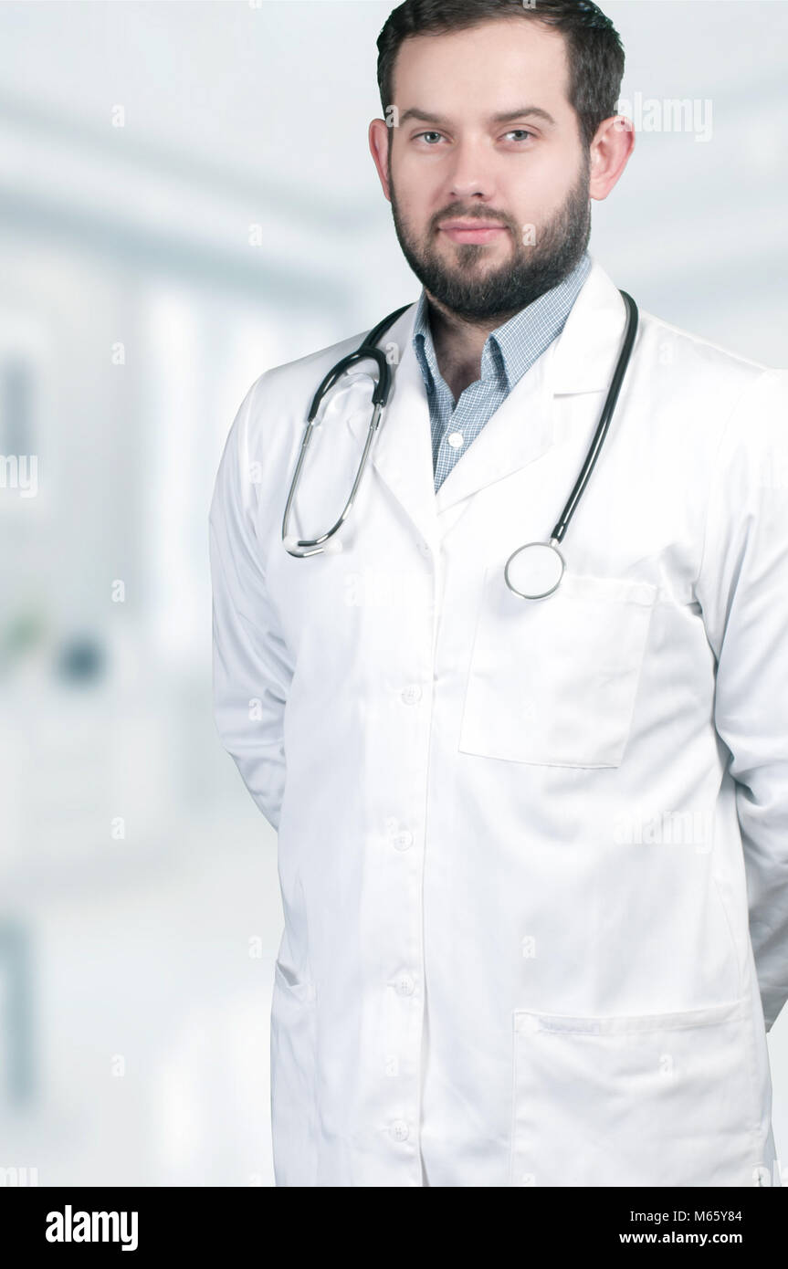 Medical doctor with stethoscope around his neck Stock Photo - Alamy