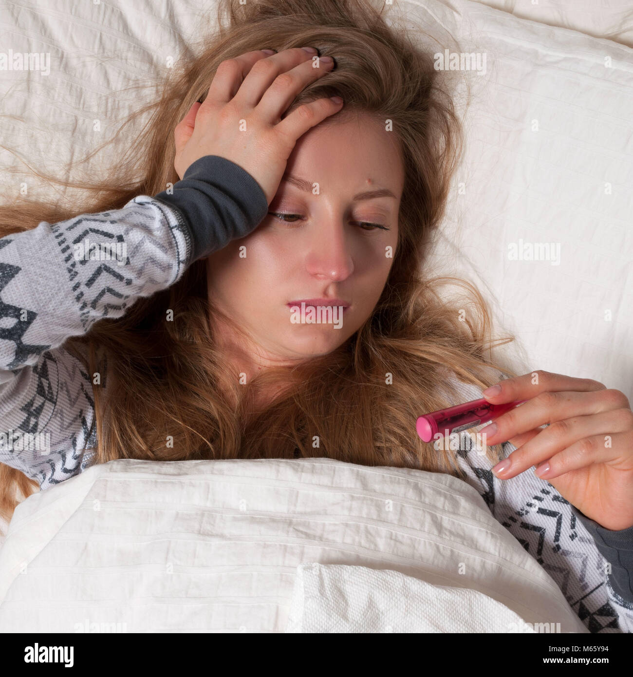 Sick Woman With Thermometer Is Lying In Bed She Has Cold Flu And High