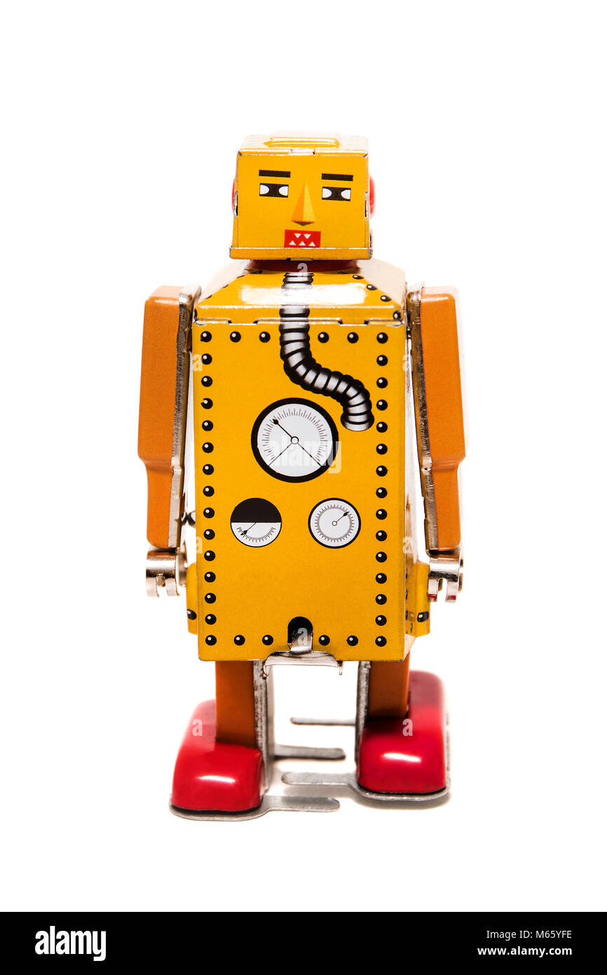 Vintage tin robot toy isolated on a white background Stock Photo - Alamy