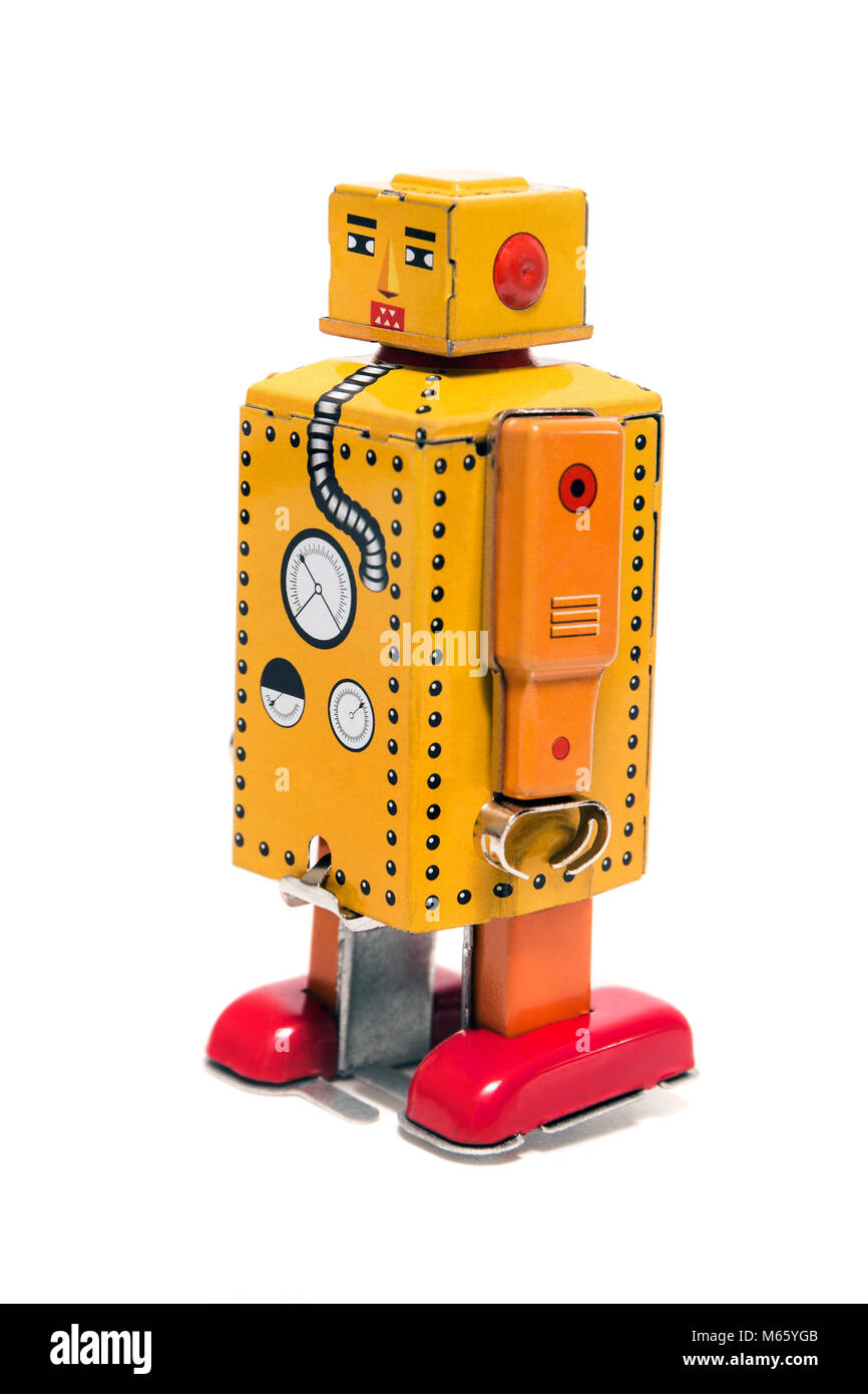 Vintage tin robot toy isolated on a white background Stock Photo - Alamy
