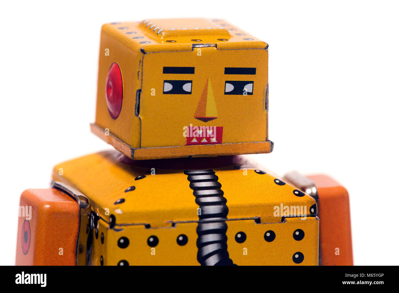 Vintage tin robot toy isolated on a white background Stock Photo - Alamy