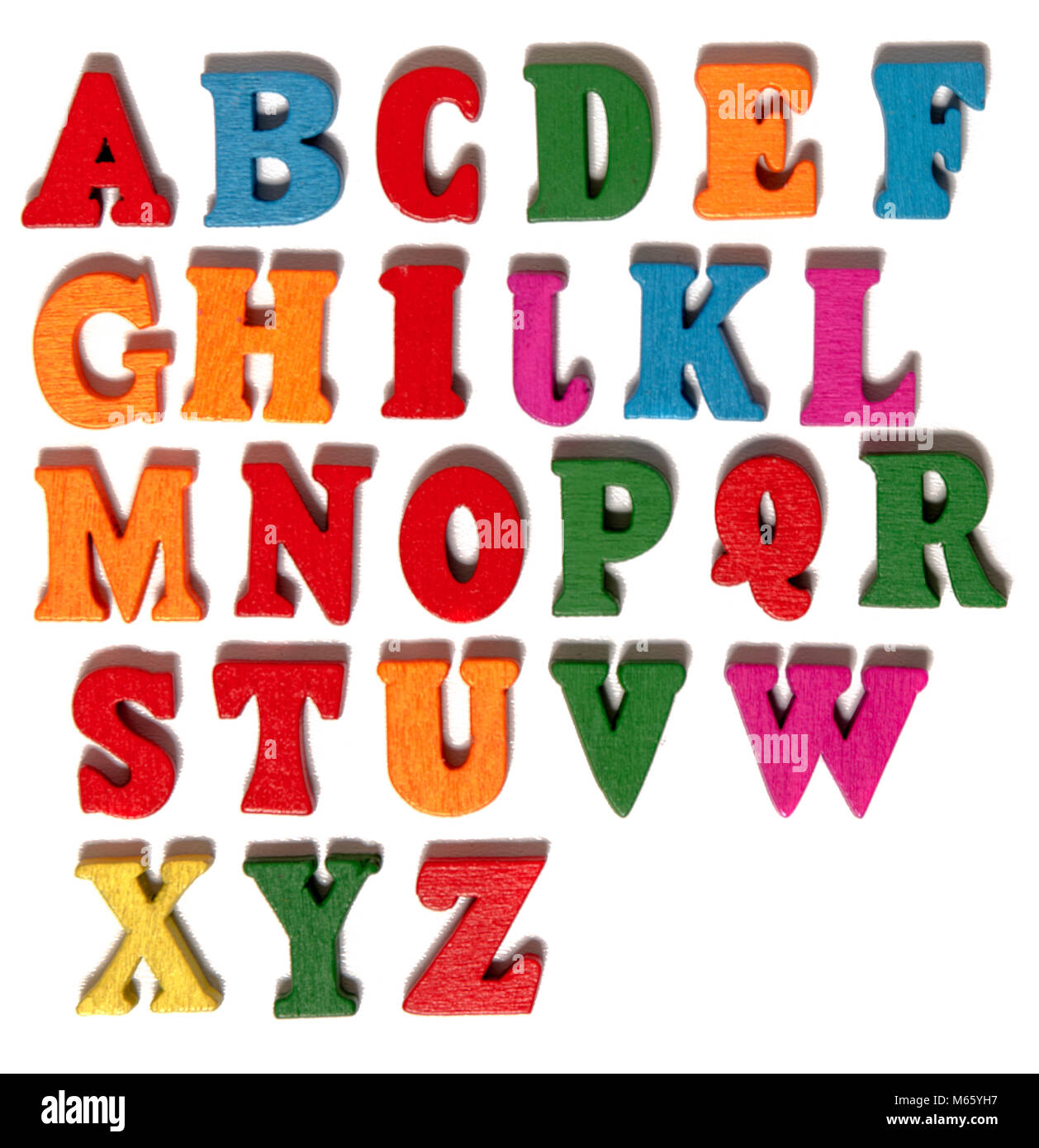 Wooden colorful letters isolated on a white background Stock Photo - Alamy
