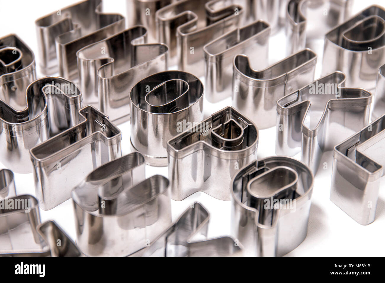 cookie cutter letters isolated on a white background Stock Photo - Alamy