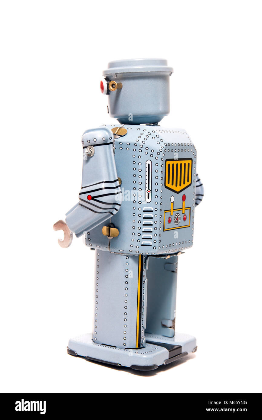 Vintage tin robot toy isolated on a white background Stock Photo - Alamy