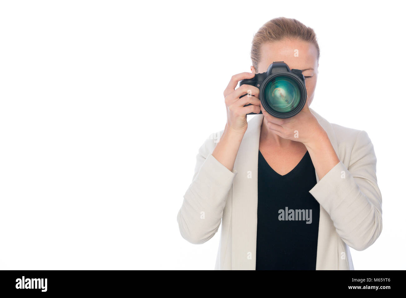 Woman photographer takes images with dslr camera Stock Photo - Alamy