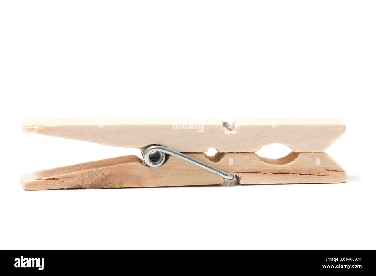 One wooden clothing peg isolated on a white background Stock Photo - Alamy