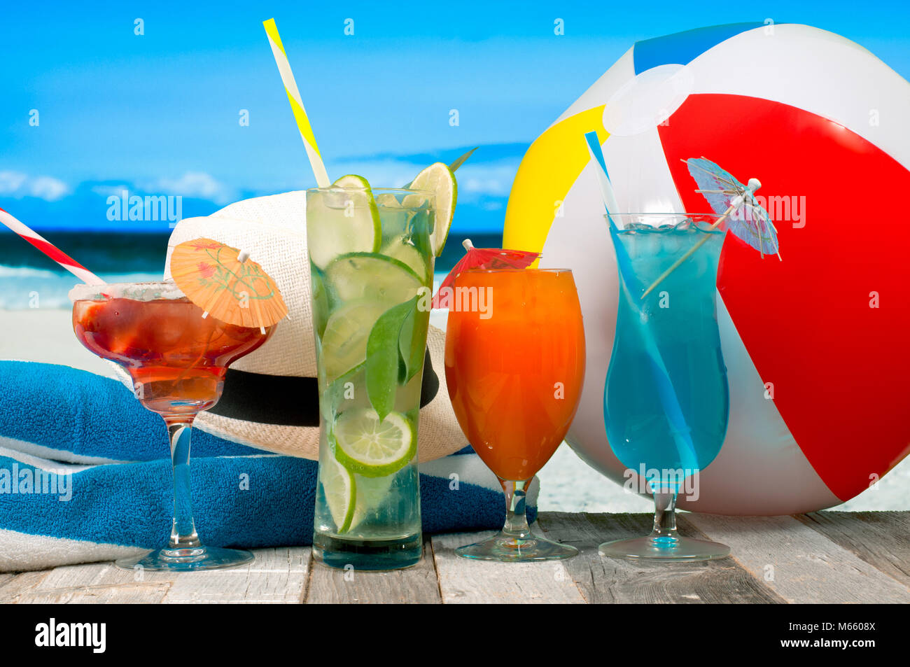 Tropical cocktails on the beach. Summer vacation on sea background ...