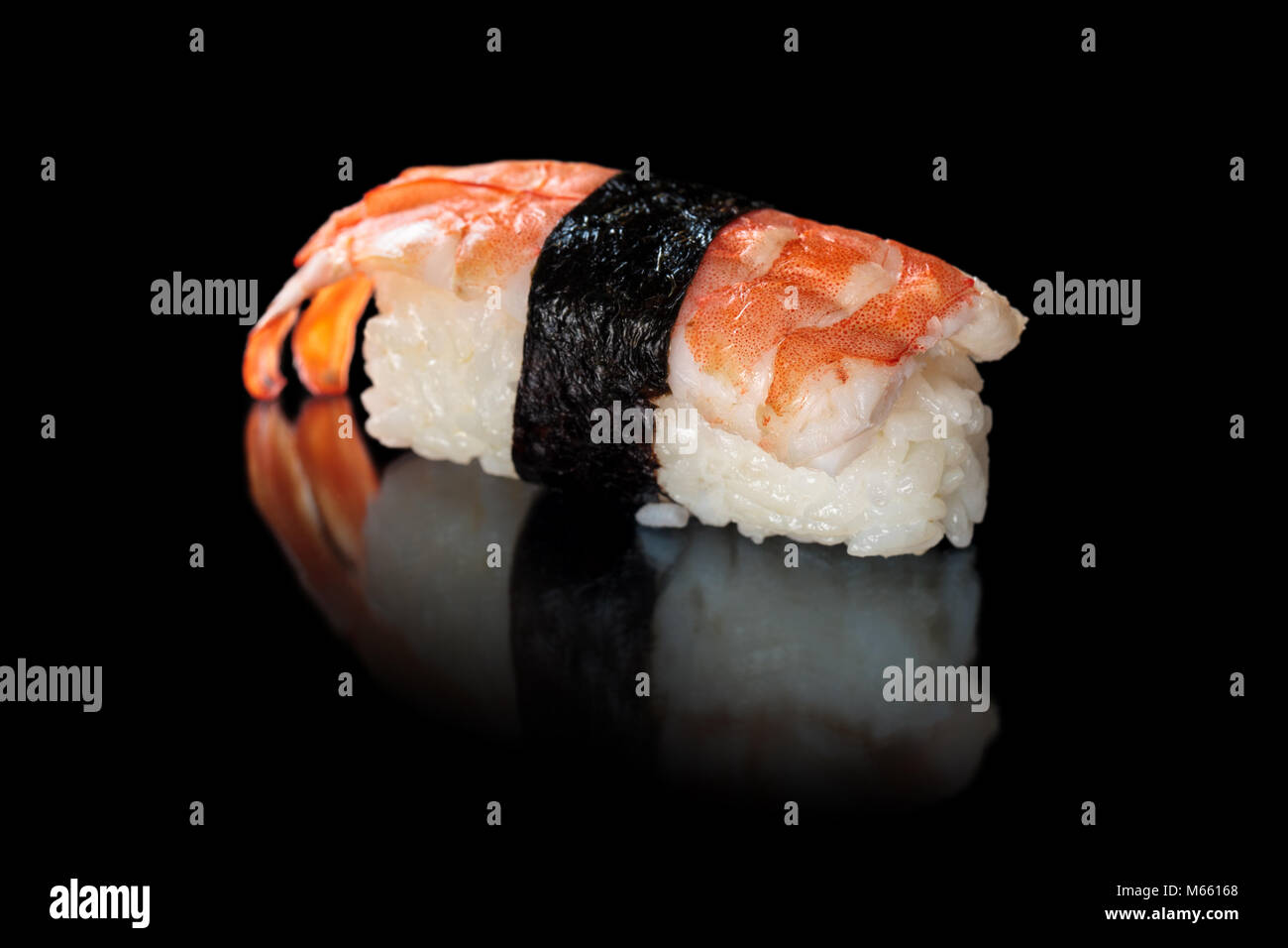 Traditional Japanese cuisine. Fresh made Sushi with salmon Stock Photo ...