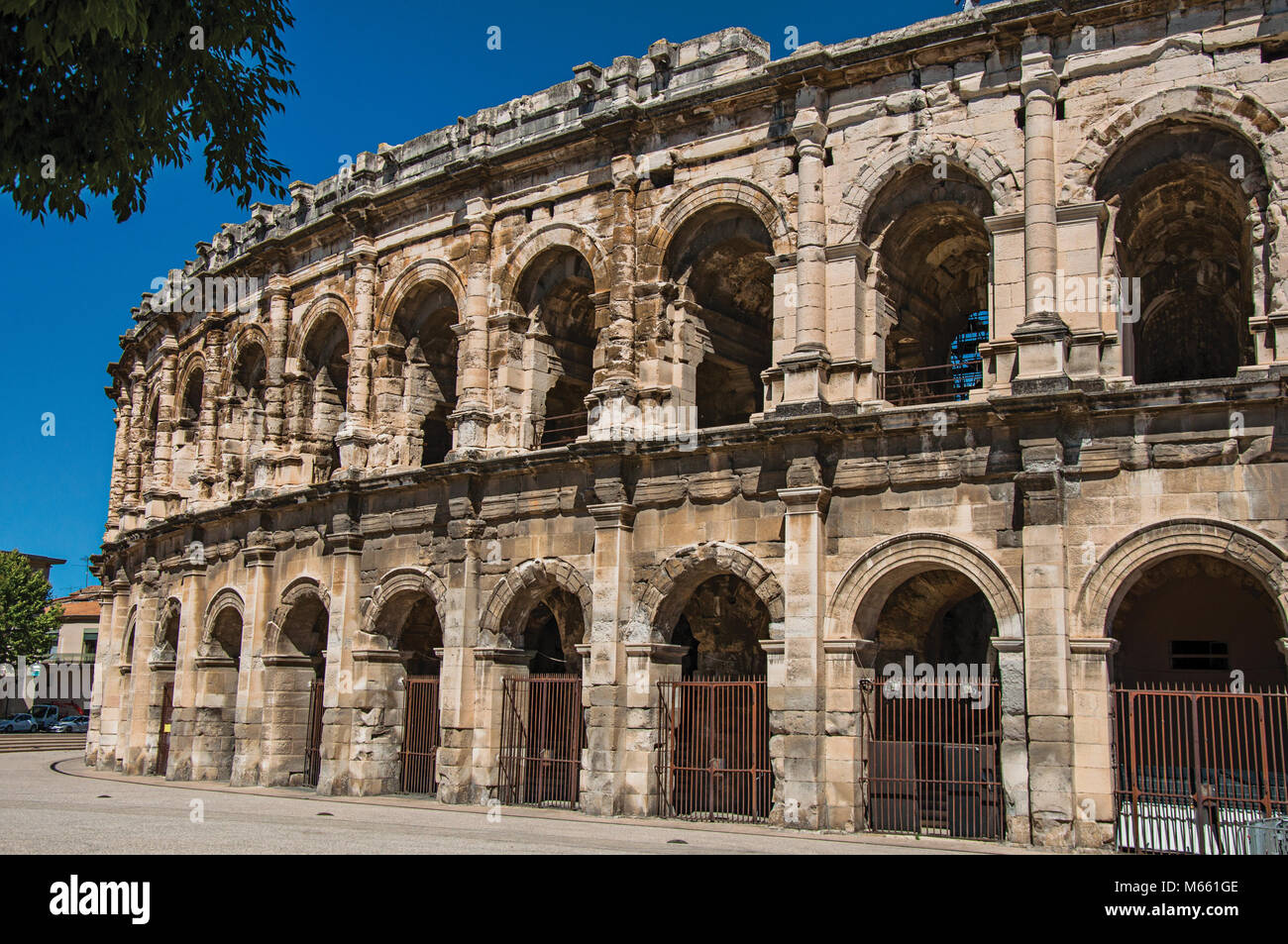 Partial view of the Nimes Arena exterior, an amphitheater of the Roman ...