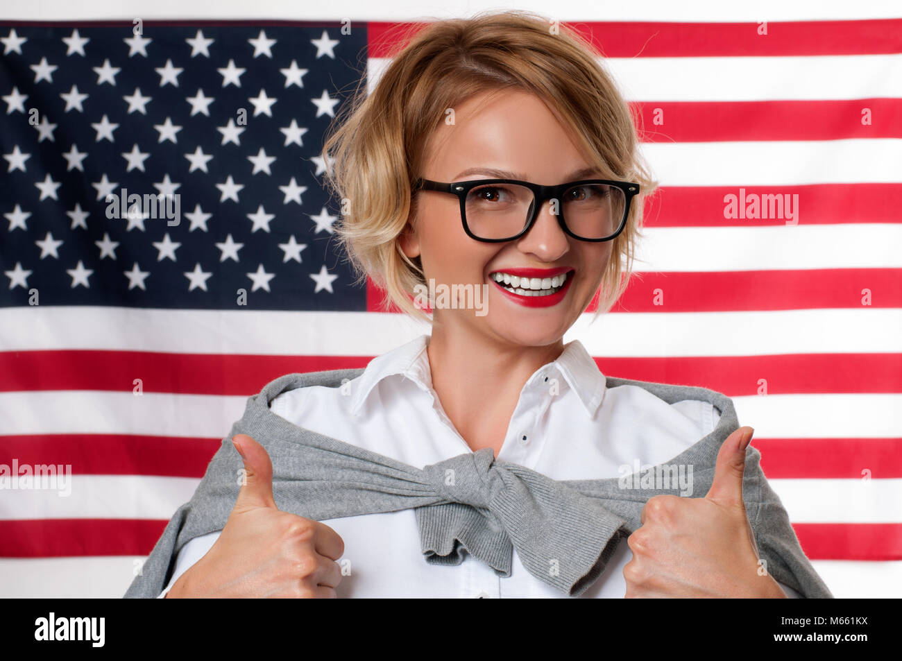 American flag. Smiling young man on United States flag background. USA ...