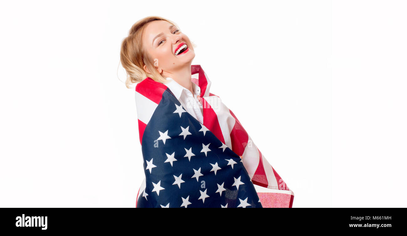 American flag. Smiling patriotic woman with United States flag. USA ...