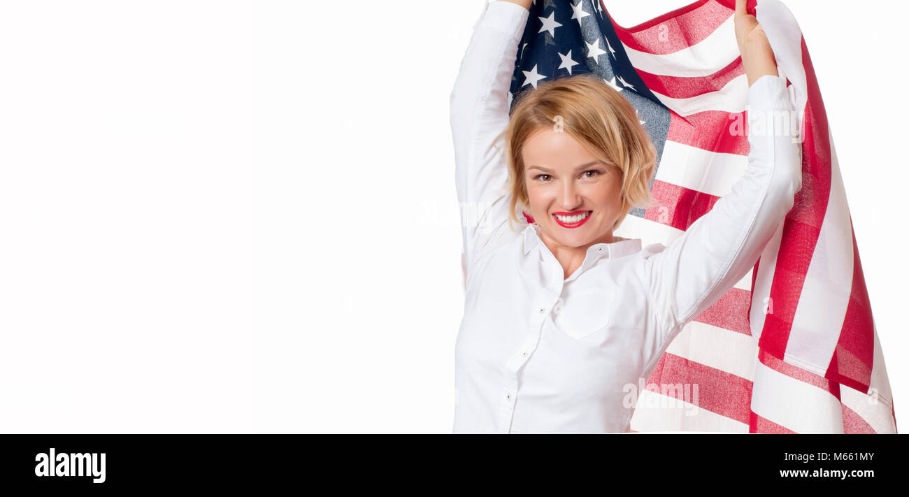 American flag. Smiling patriotic woman holding United States flag. USA ...